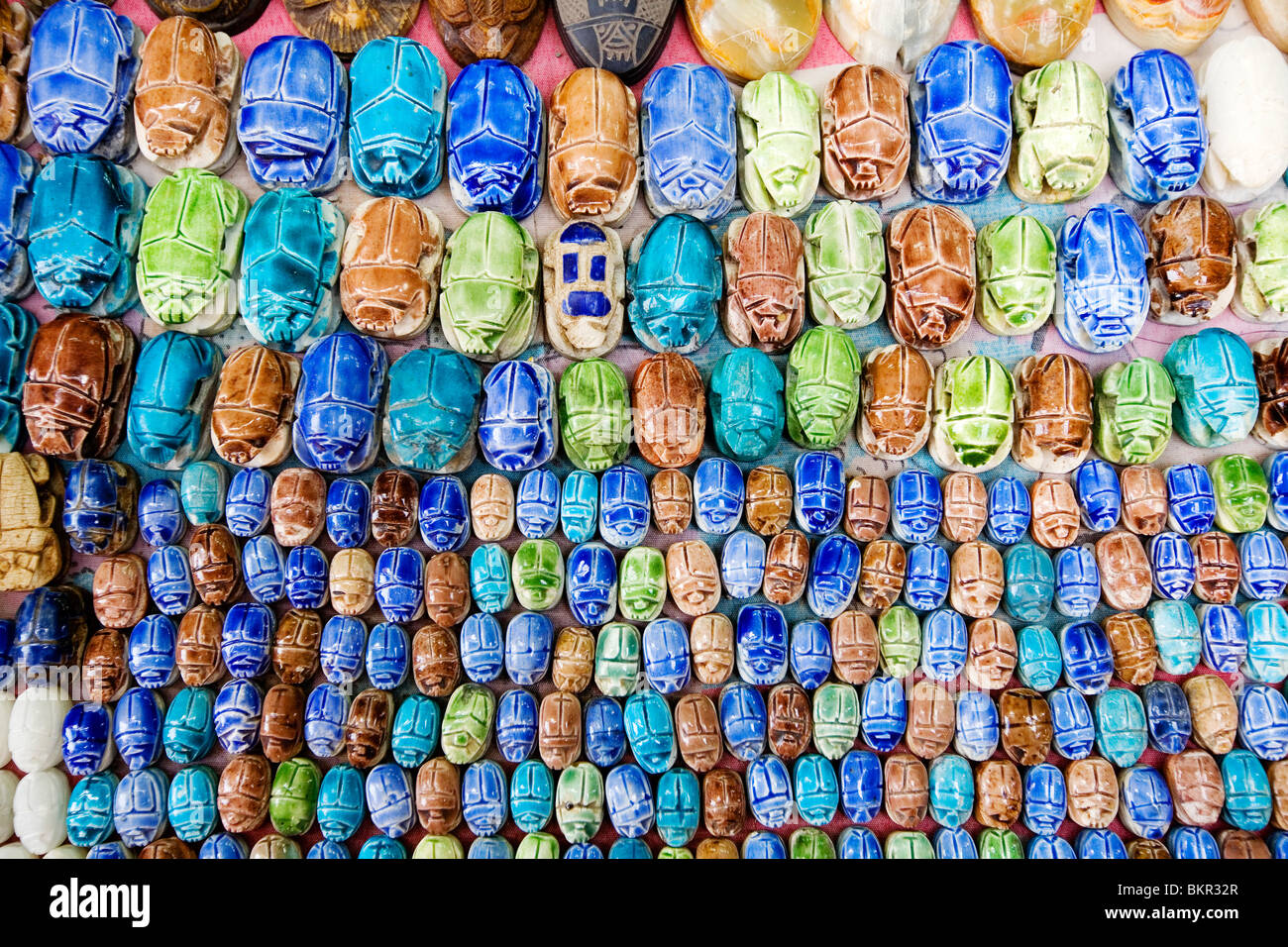 Egypt, Luxor. Rows of glazed ceramic scarab beatles for sale on a ...