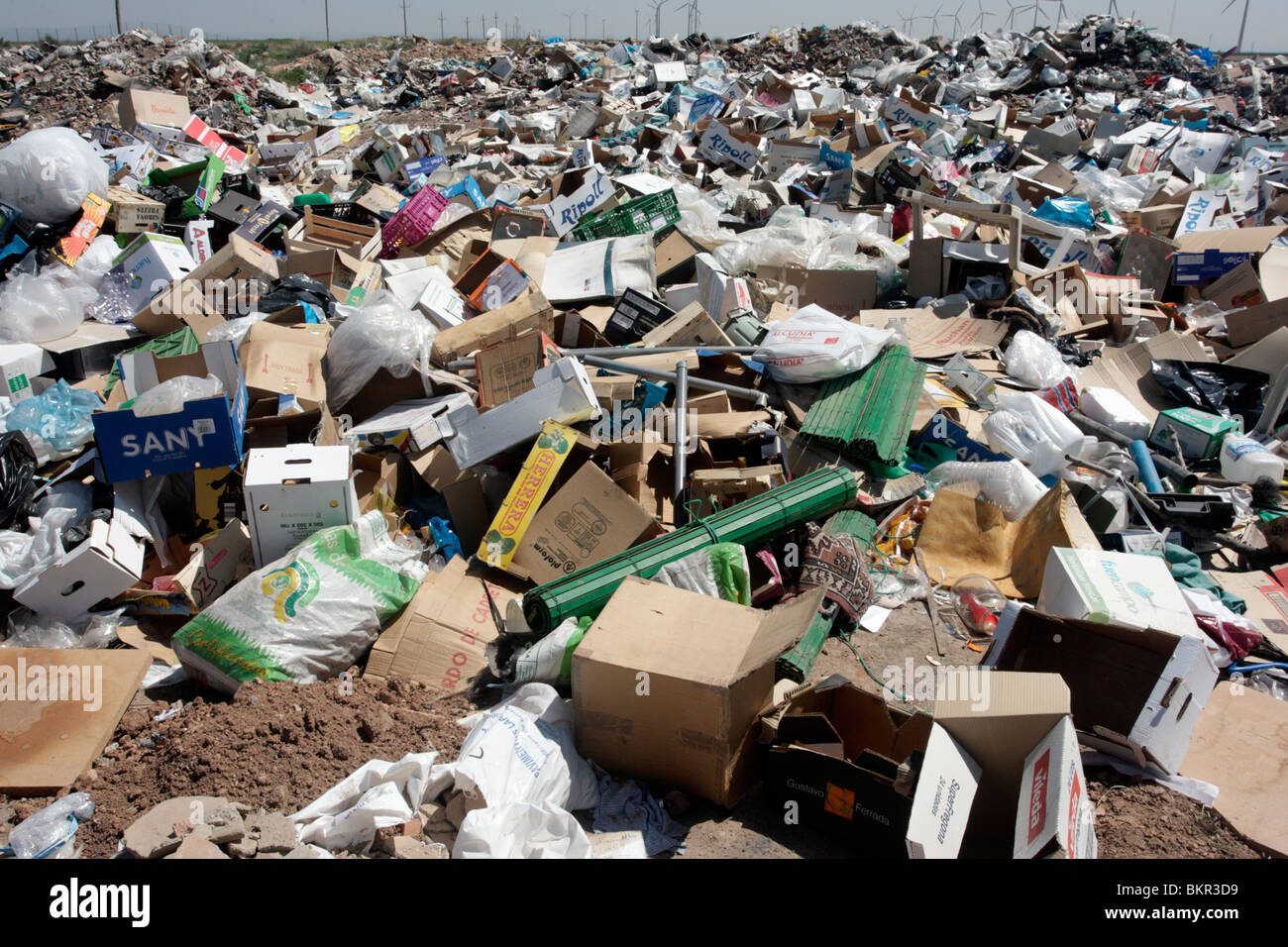 Rubbish with wind turbines in background, central Spain, April 2010 ...