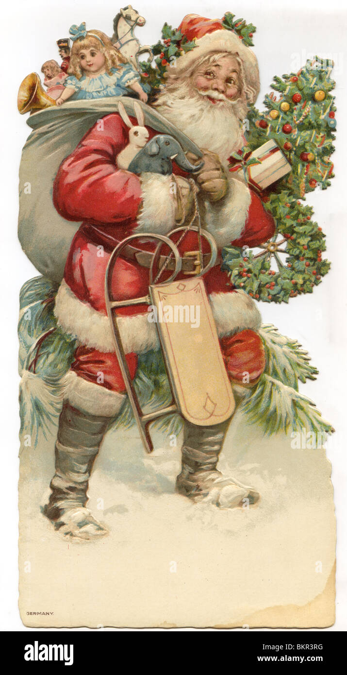 Father Christmas with Christmas Tree and Sack of Toys Stock Photo - Alamy