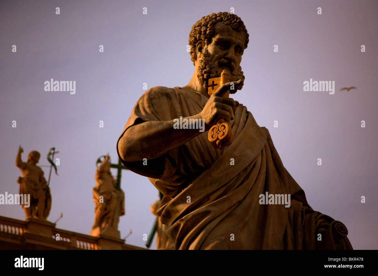 Italy, Rome; A statue of St.Peter, holding keys in hand, in Piazza San ...