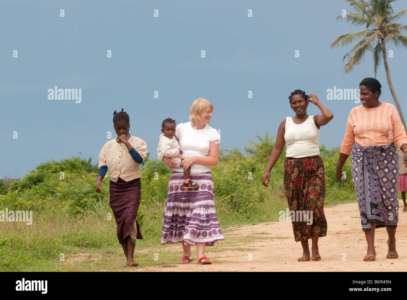 Volunteers working with local children, Mombasa, Kenya Stock Photo - Alamy