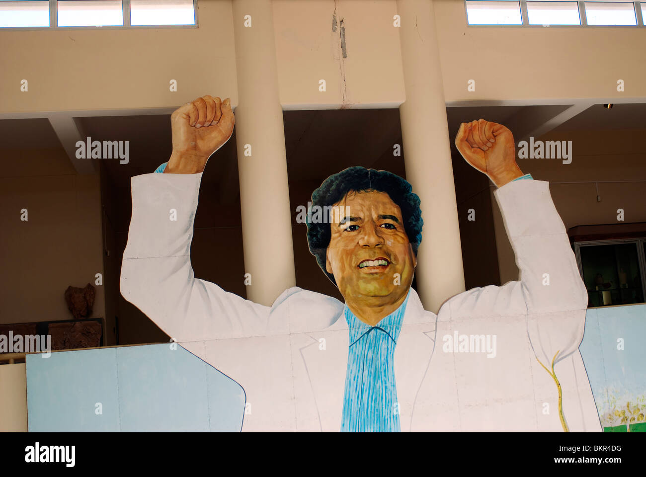 Libya, Leptis Magna. A giant painting of Mu'ammar Gaddafi inside the ...