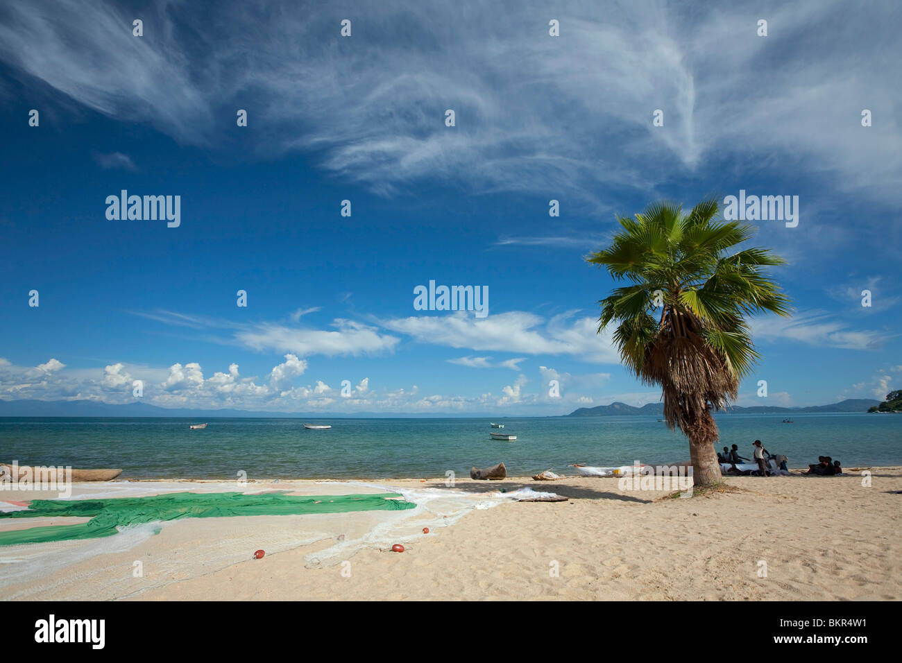 Malawi, Monkey Bay. Fishing nets dry in the sun on the beach of Lake ...