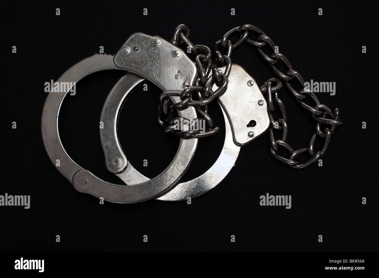 Handcuffs arrest restraint restrain hi-res stock photography and images ...