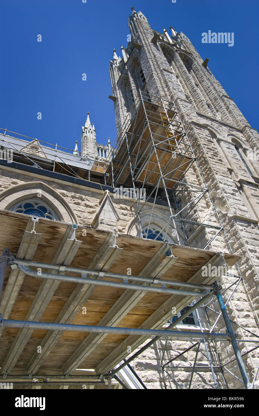 Scaffolding on the side of a church, where renovations are taking place ...