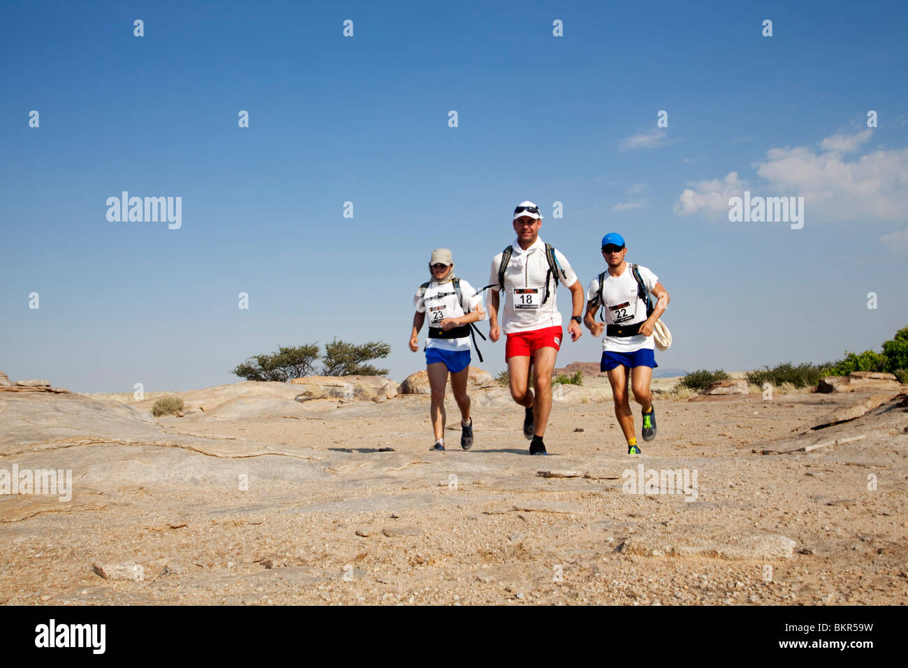 Namibia, Namib Desert, runners compete in the Namibia Ultra Marathon ...