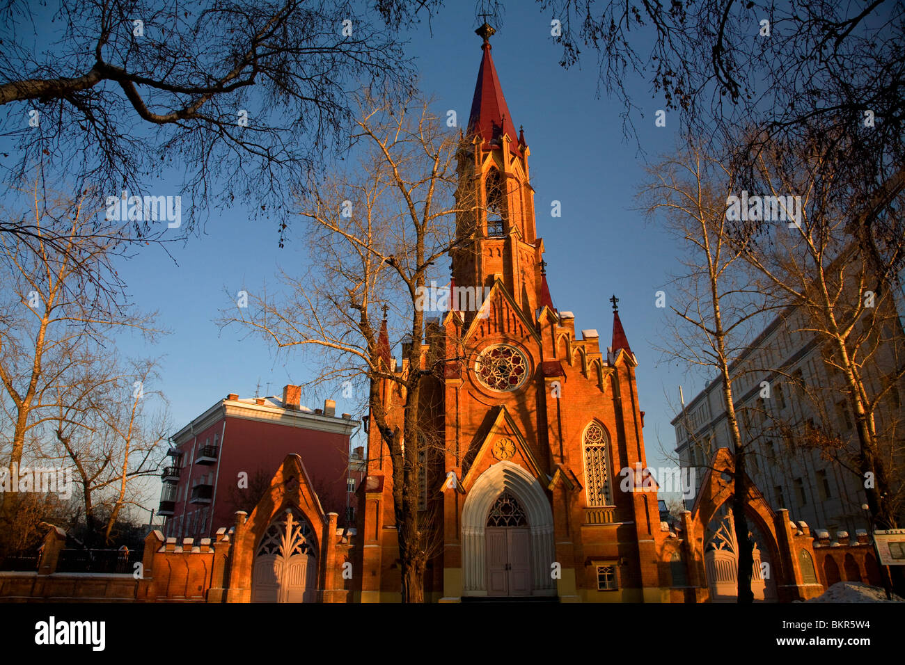 Russia, Siberia, Irkutsk; A neo-Gothic styled church surrounded by ...