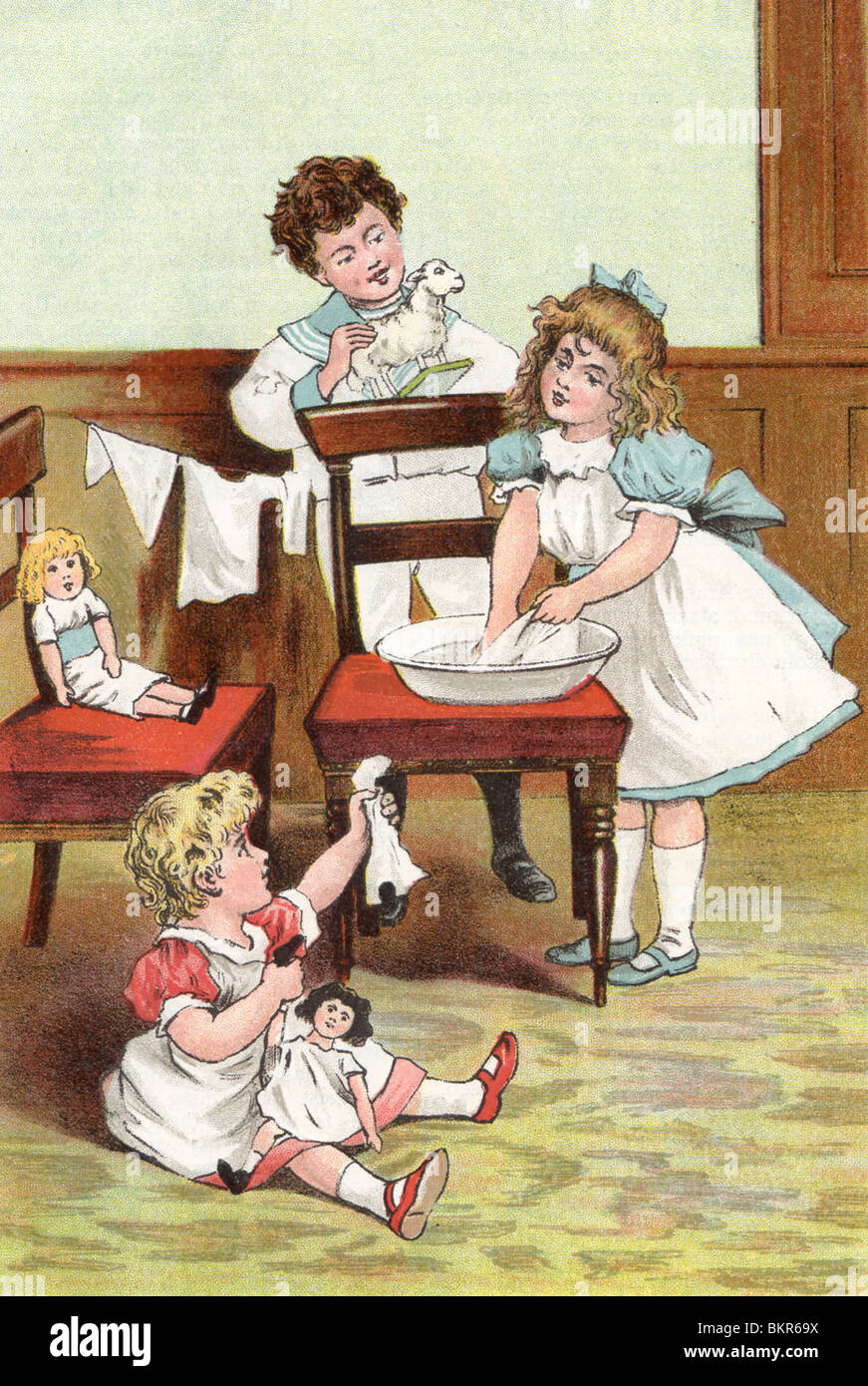 Washing Day. Children washing their Dolls Clothes Stock Photo - Alamy