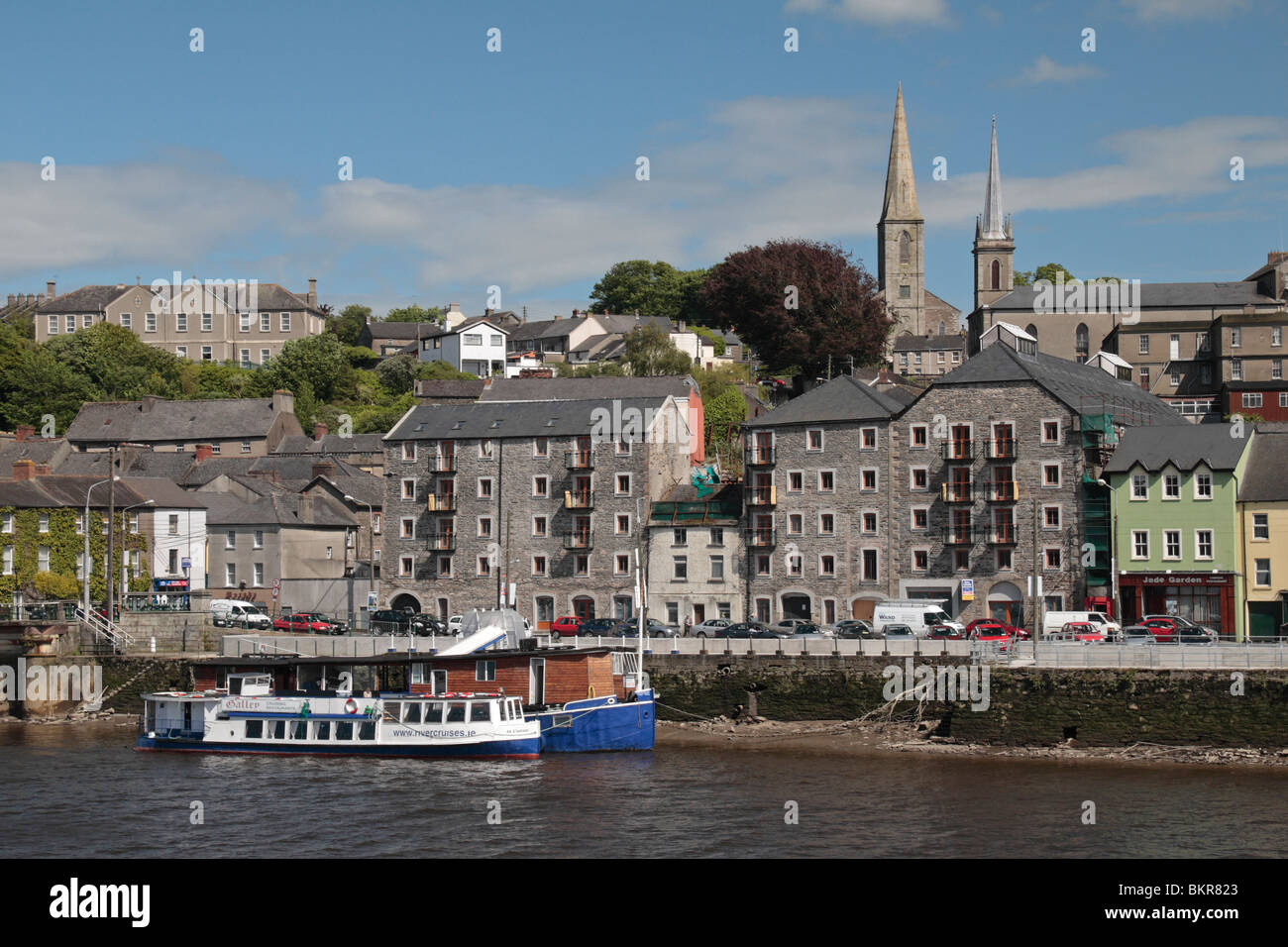 A view across the River Barrow towards the northern end of New Ross, Co ...