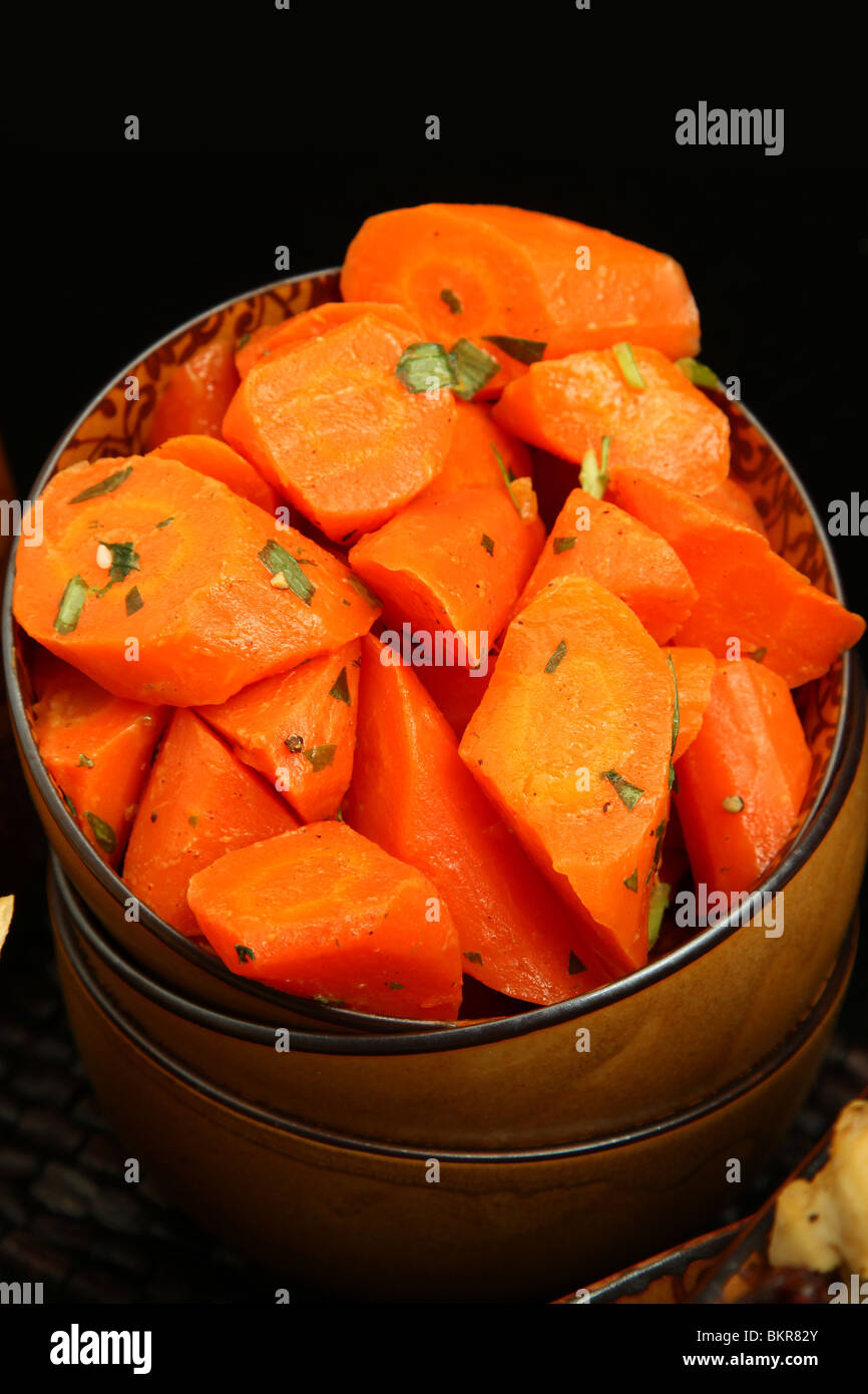 Bowl of homemade honey baked carrots Stock Photo - Alamy