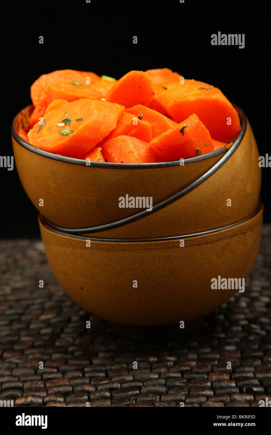 Bowl of homemade honey baked carrots Stock Photo - Alamy