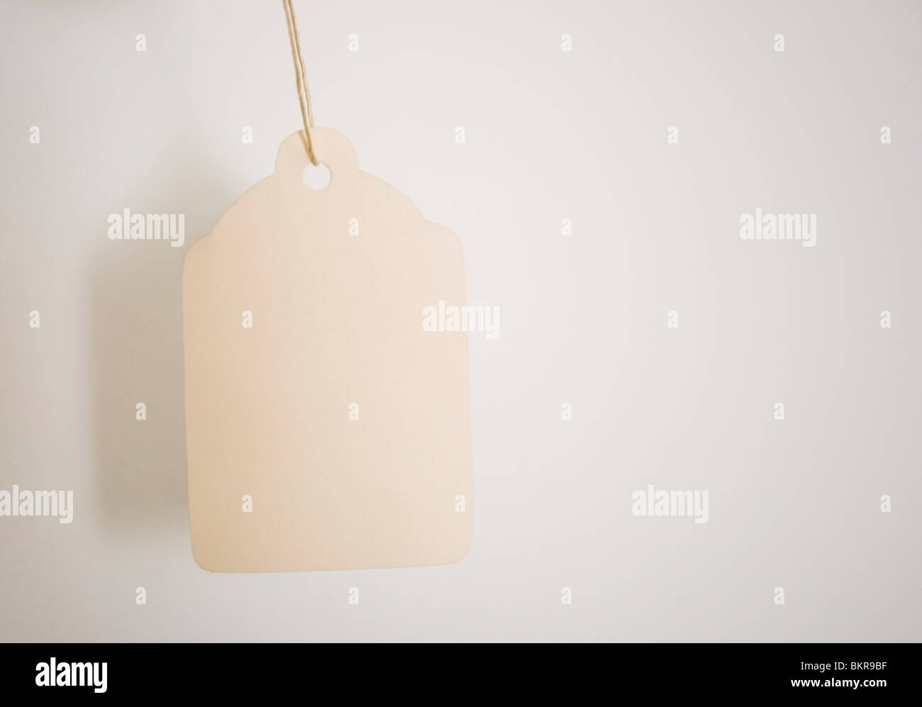 A Tag On A String Stock Photo - Alamy