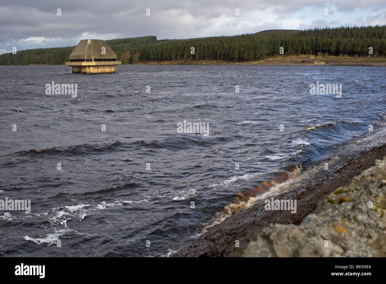 Kielder Water reservoir with valve tower from dam wall Stock Photo - Alamy