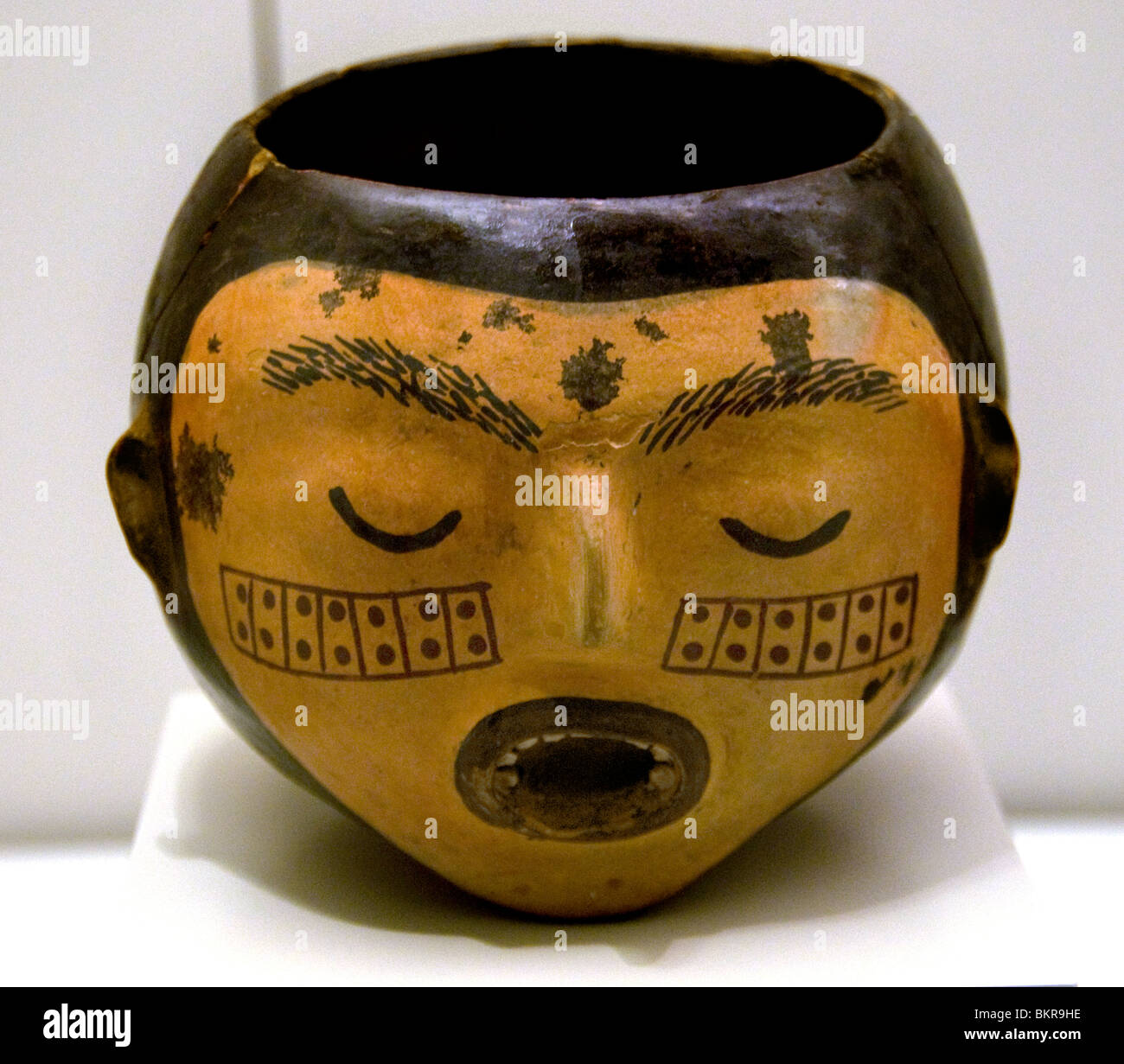 Nazca 100 bc 700 ad vessel representing trophy head hi-res stock ...