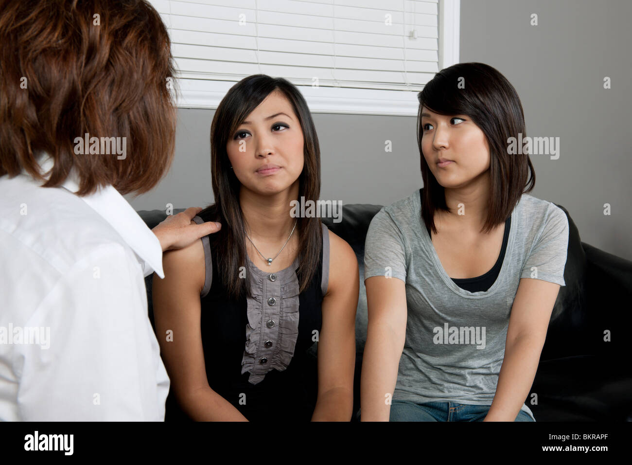Women Showing Support For A Young Woman Stock Photo - Alamy