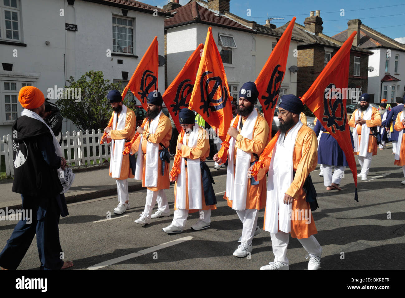 Five young men carrying khalsa flags at the head the 12th annual ...