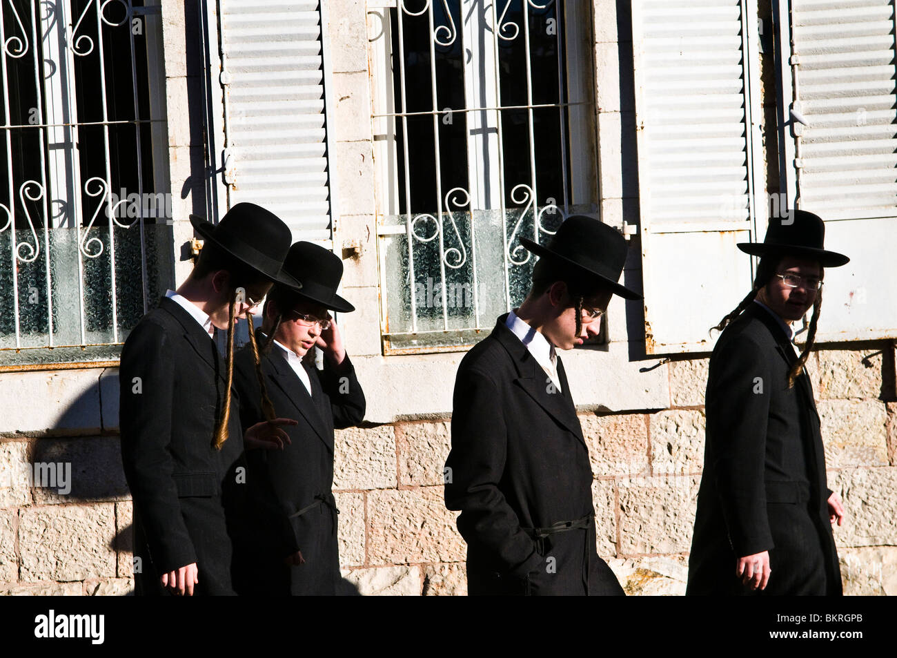 Young Orthodox Yeshiva boys walking in Mea Sharim neighborhood Stock ...