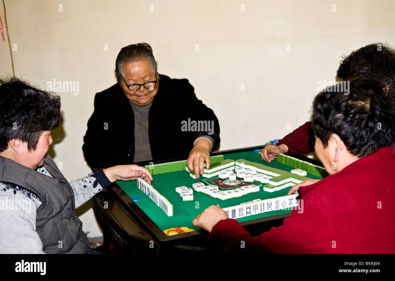 Chinese friends play MaJiang. A very popular game in China Stock Photo ...