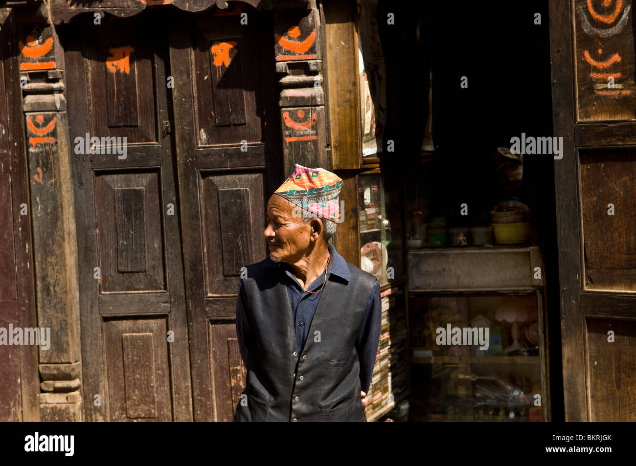 A Nepali man waring a traditional hat in Kathmandu Stock Photo - Alamy