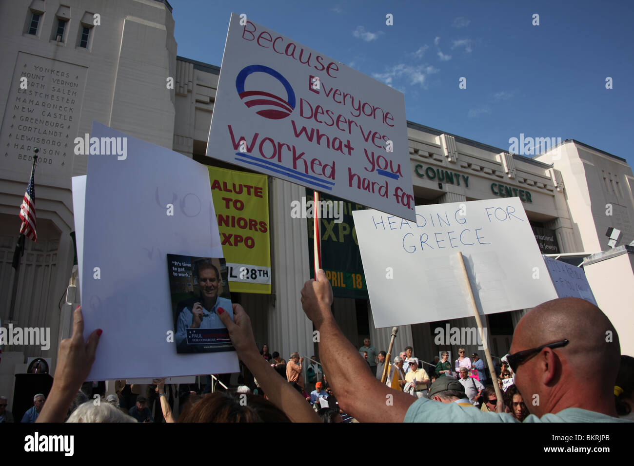 American activists hold signs protest hi-res stock photography and ...