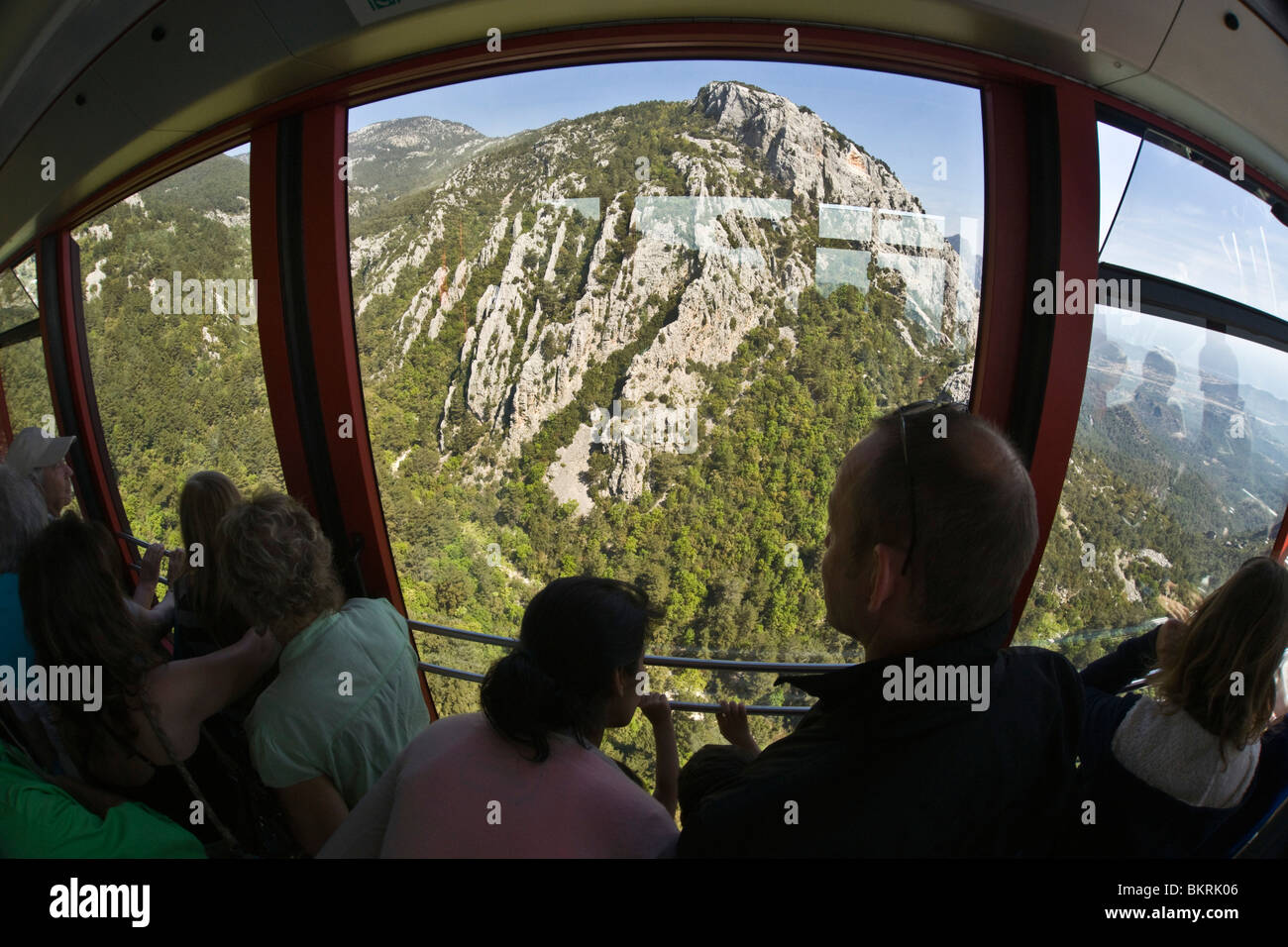 Passengers in the world's highest cable car lift to the summit of Mount ...