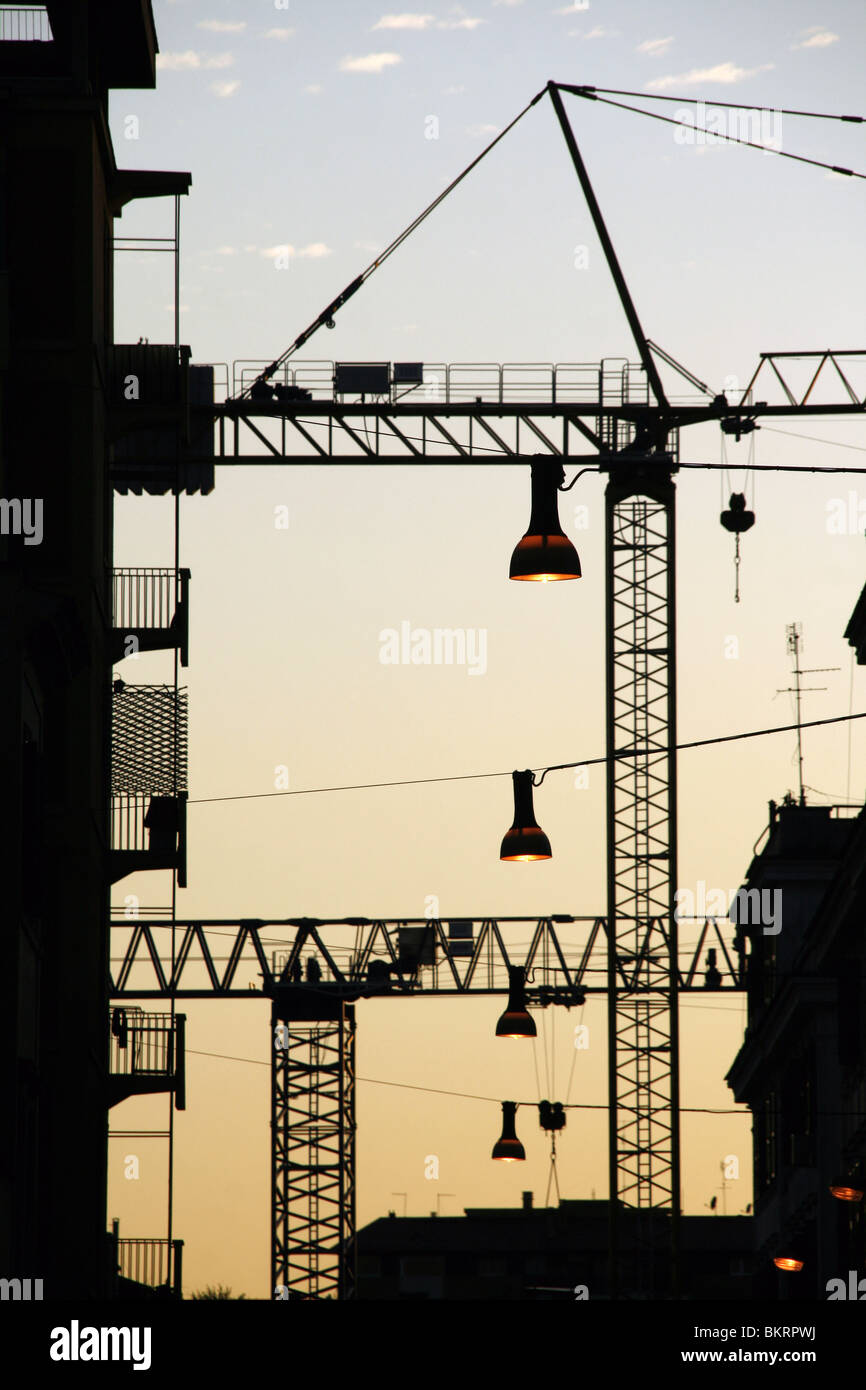 cranes on building site in city town Stock Photo - Alamy