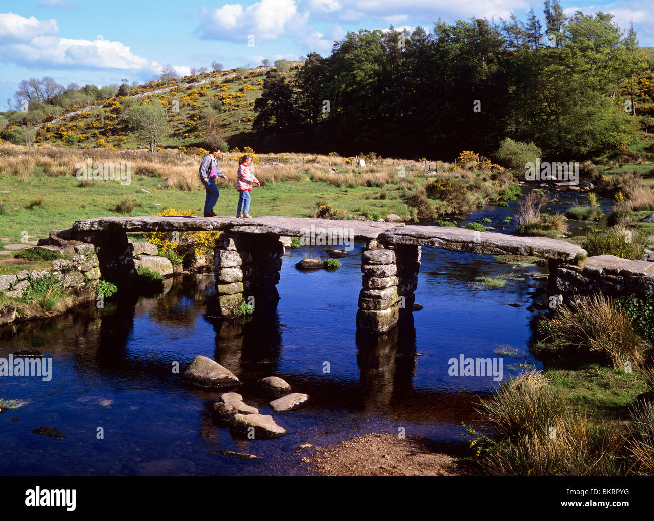 The ancient Clapper Bridge over the East Dart River at Postbridge on ...