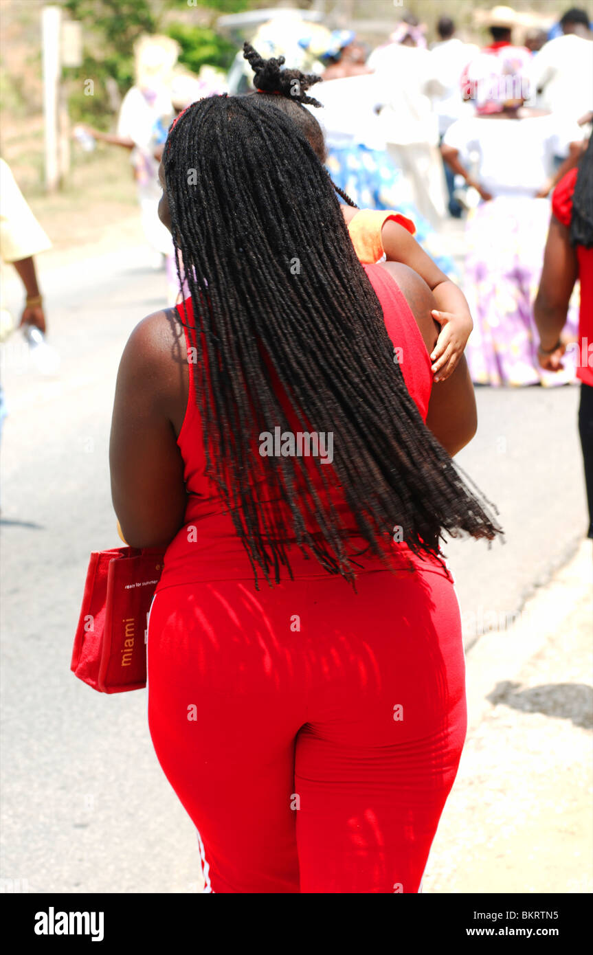 Curacao, woman with braids Stock Photo - Alamy