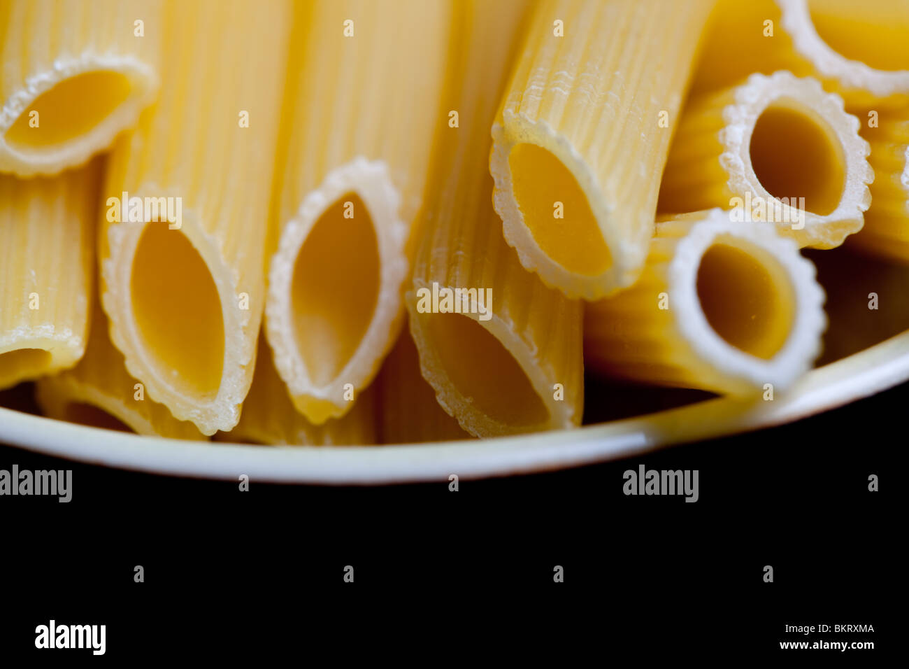 Dried penne pasta Stock Photo - Alamy