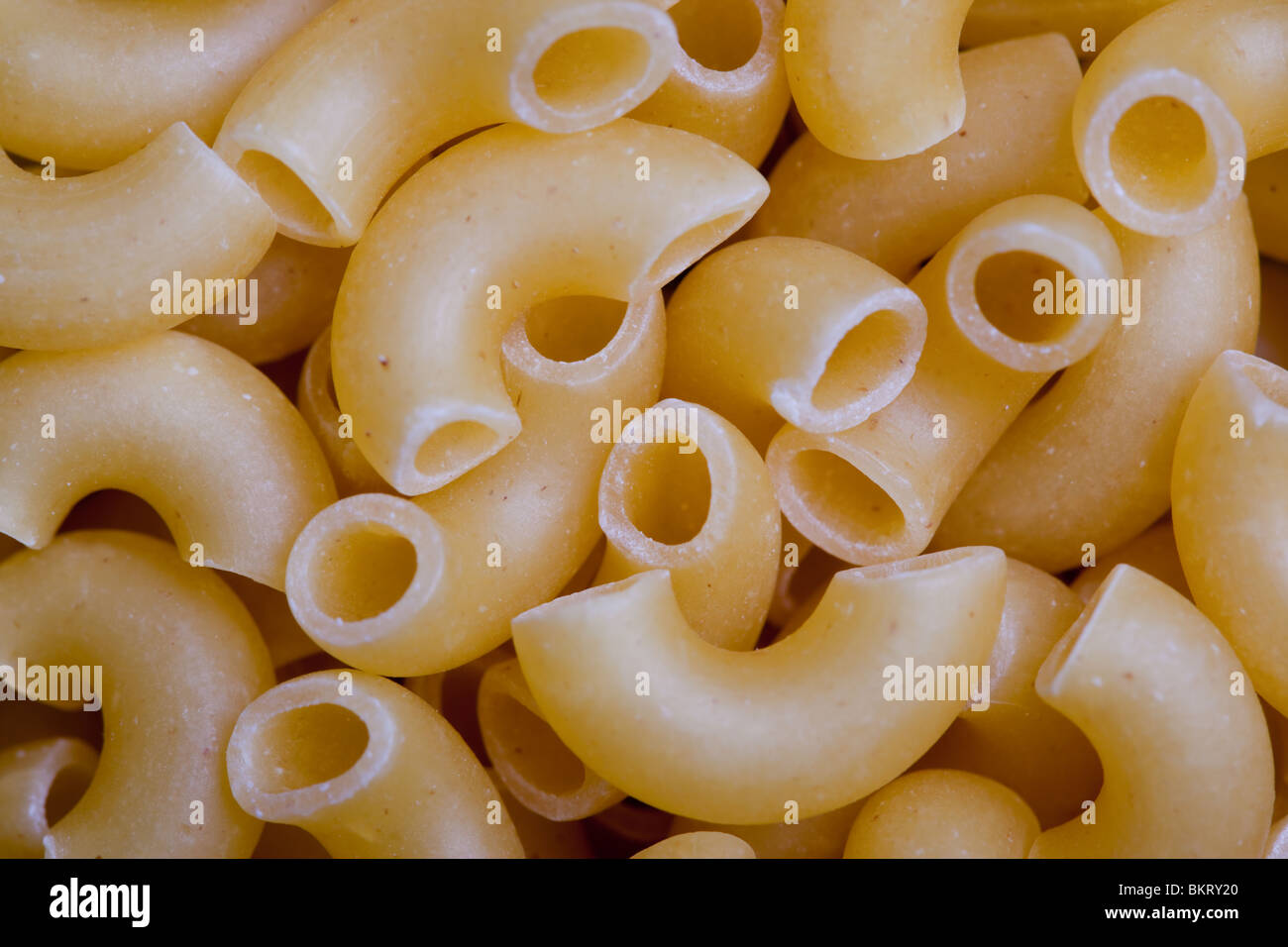 Dried macaroni pasta Stock Photo - Alamy