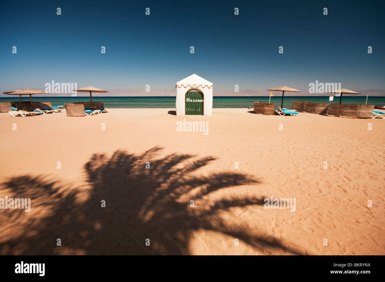 An exotic and beautiful beach on the Egyptian coastline with a shadow ...