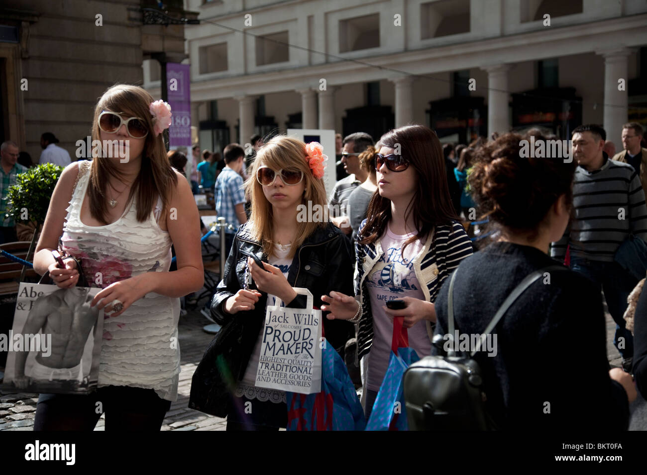 Fashion Conscious Teenagers In Sunglasses Parade Around Covent Garden