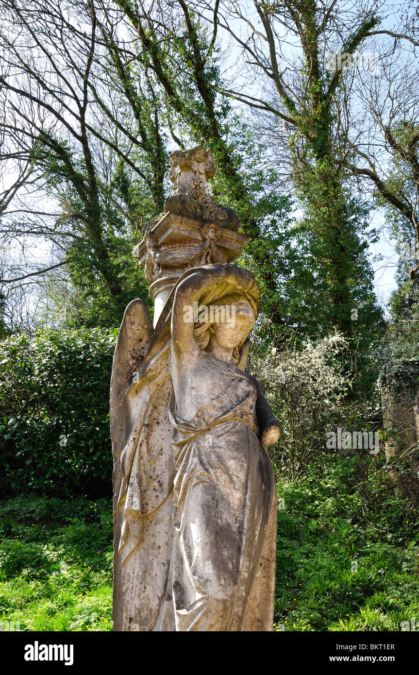 Stone angel in Highgate Cemetery West, London Stock Photo - Alamy