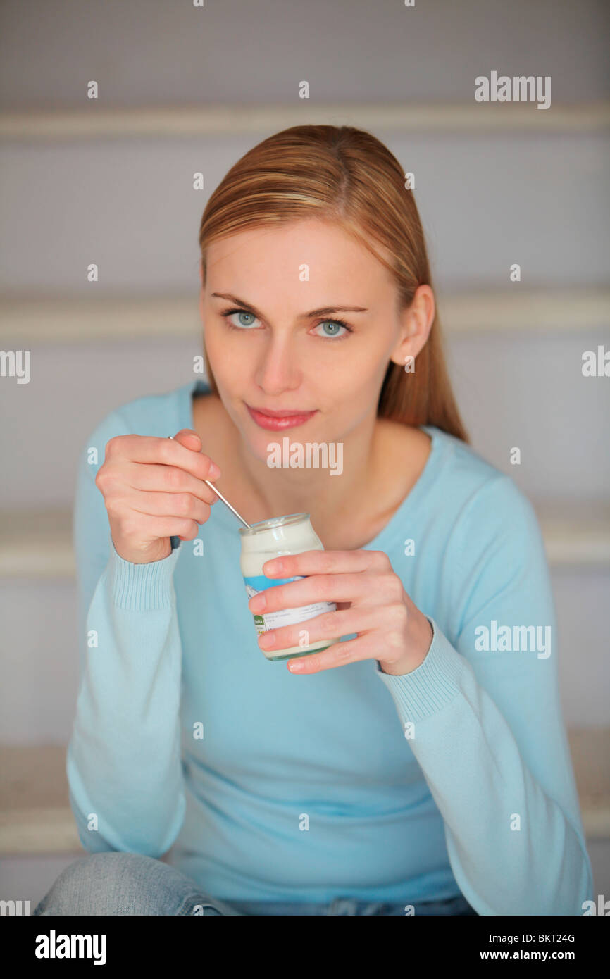 Person smiling women yogurt hi-res stock photography and images - Alamy