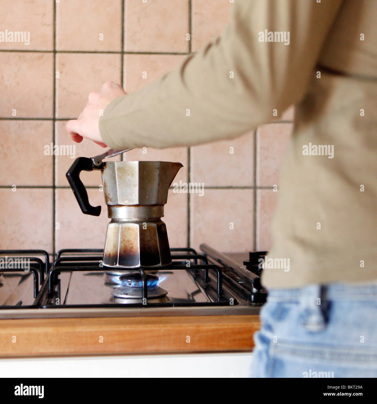 woman in the kitchen preparing coffee Stock Photo - Alamy