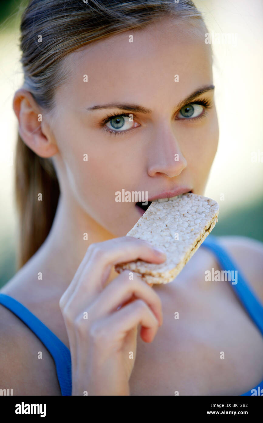 girl eating a snack Stock Photo - Alamy