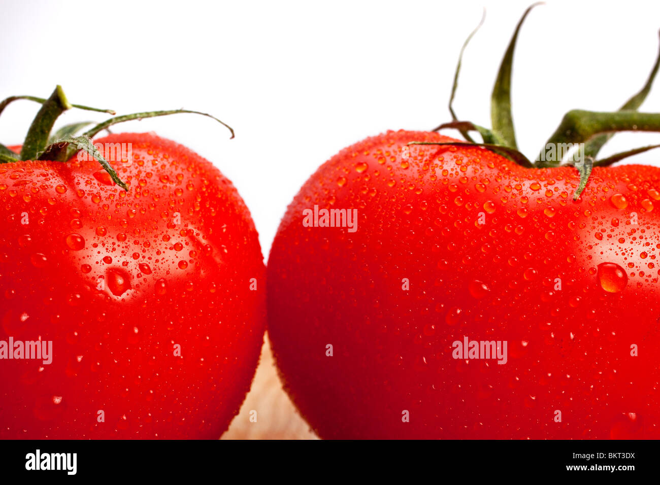 Two fresh red tomatoes hi-res stock photography and images - Alamy