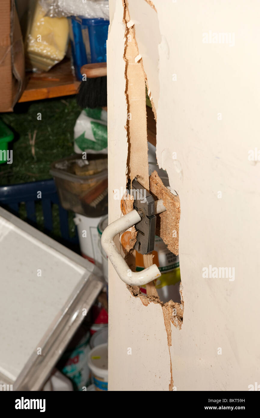 Office door smashed with sledge hammer to gain entry in emergency Stock ...