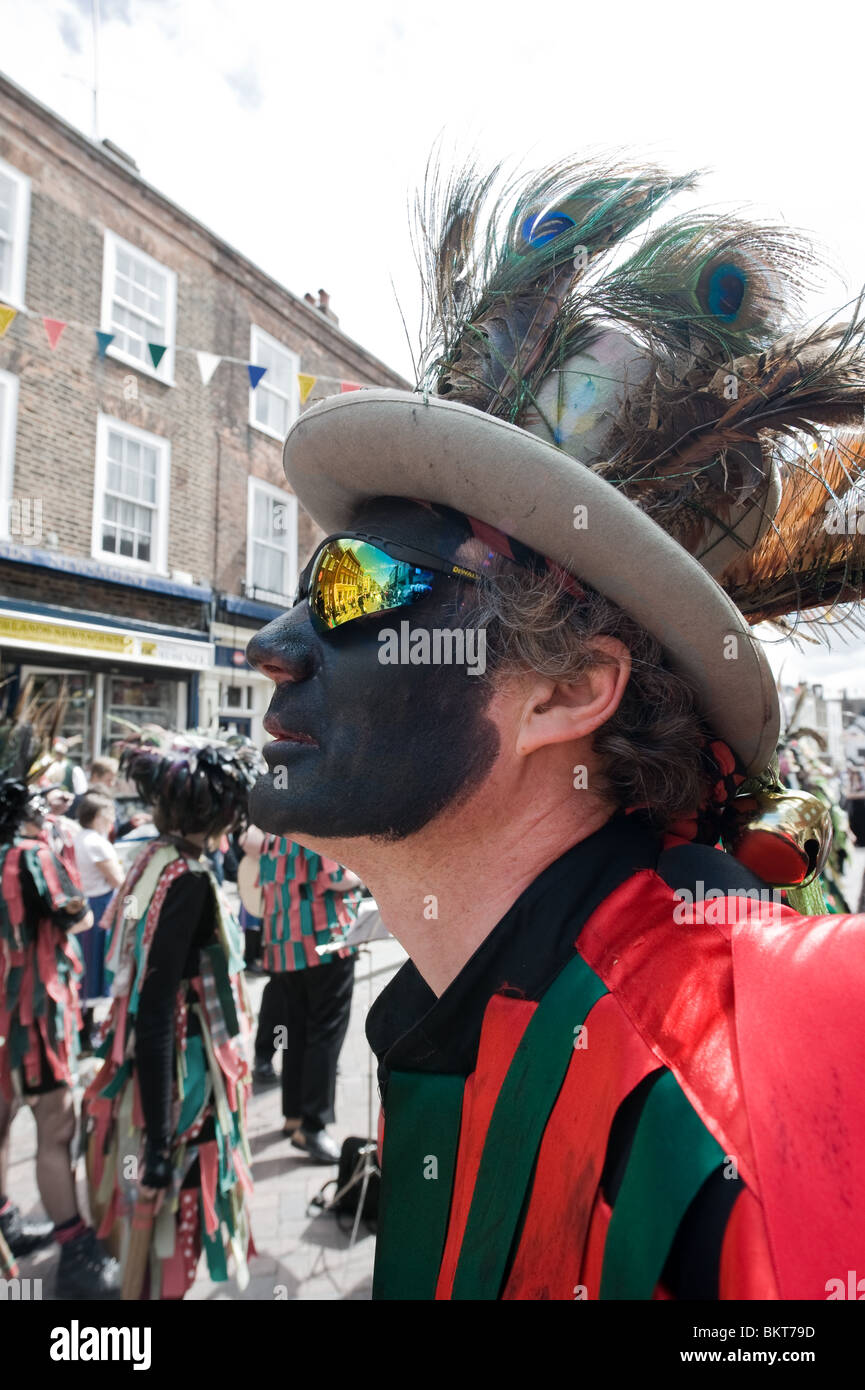 A member of a border morris side wearing reflective sunglasses at the ...