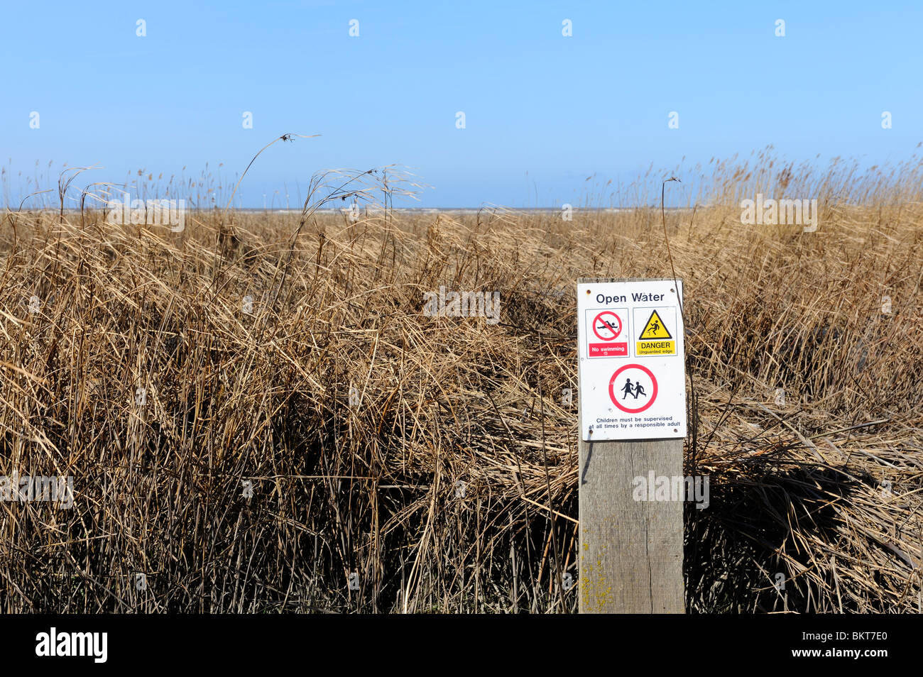 Warning sign about deep water on a beach in Prestatyn, North Wales ...