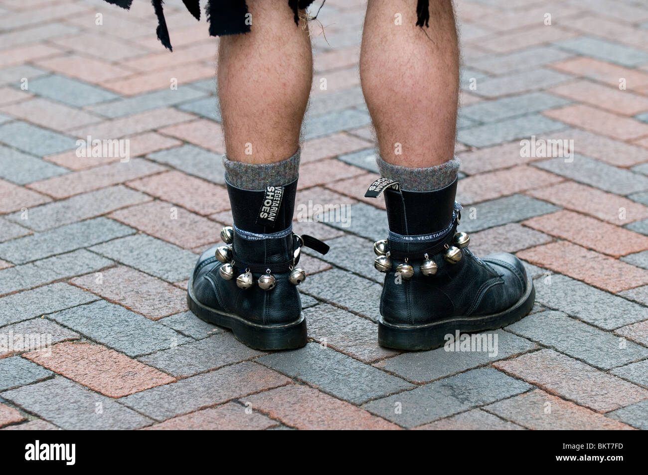 Bare legs wearing boots and bells at the Sweeps Festival Stock Photo ...
