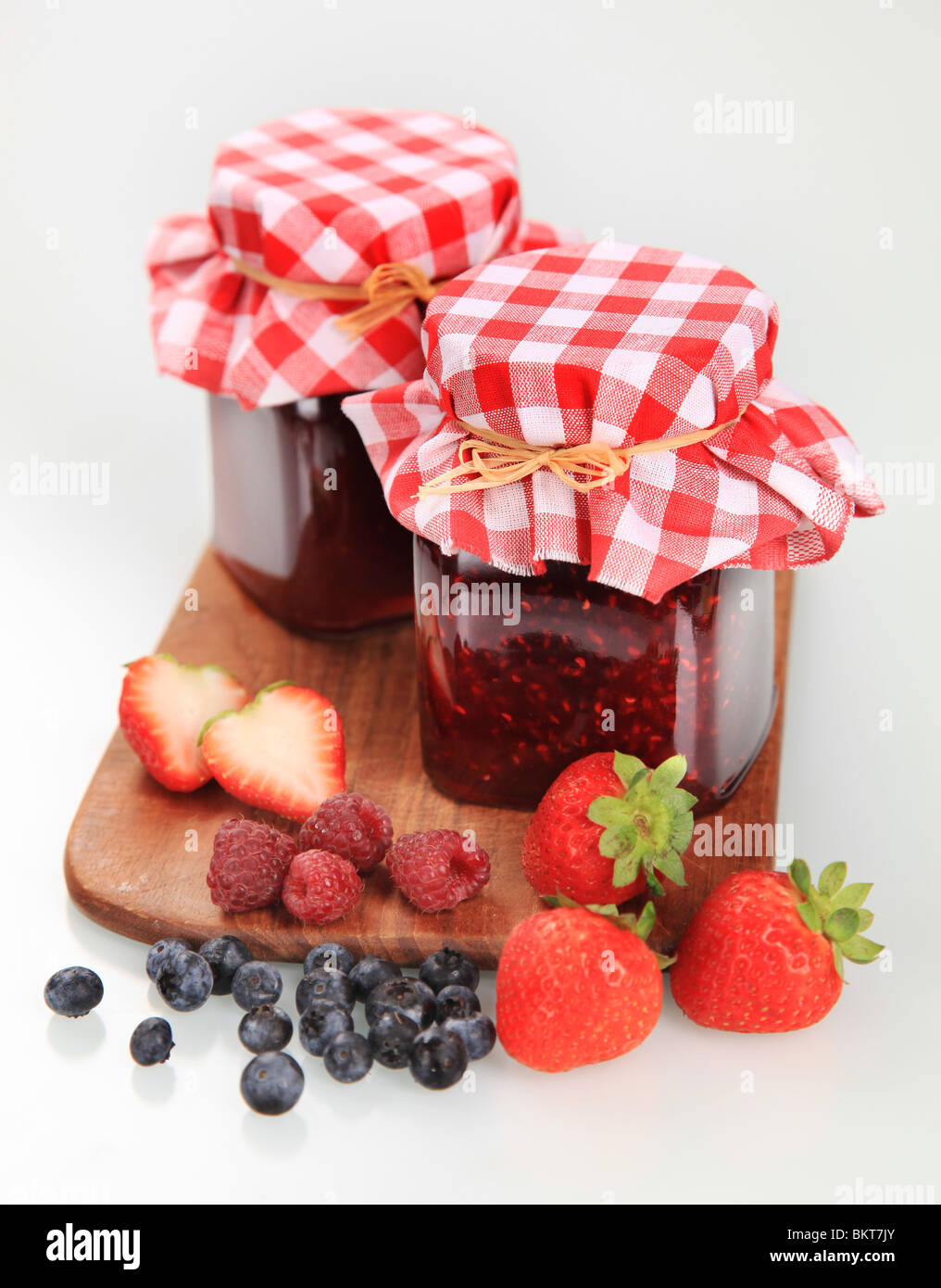 Two jars of homemade fruit preserve Stock Photo - Alamy