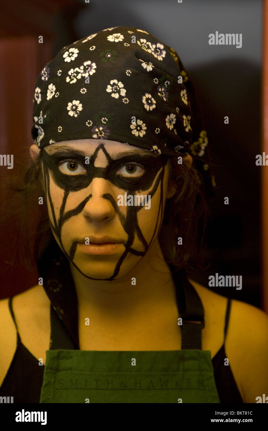 Young artist with a painted face Stock Photo - Alamy