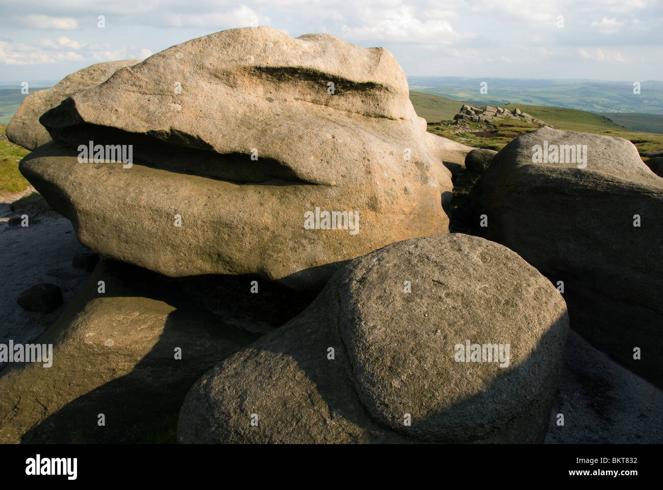 Wind sculpted sandstone rocks on the Kinder Scout plateau above ...