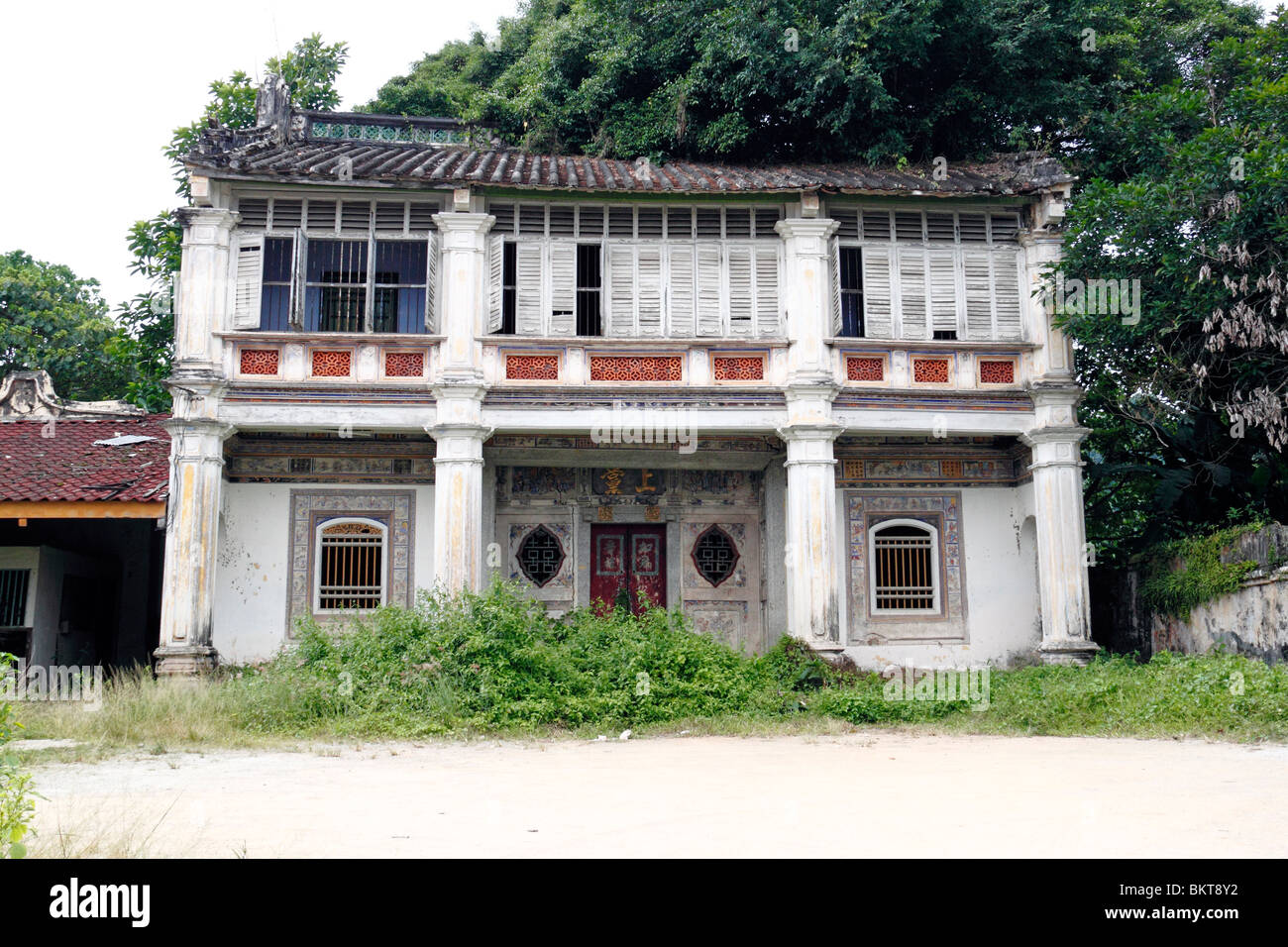 An image of a haunted Chinese mansion in a rural surrounding Stock ...