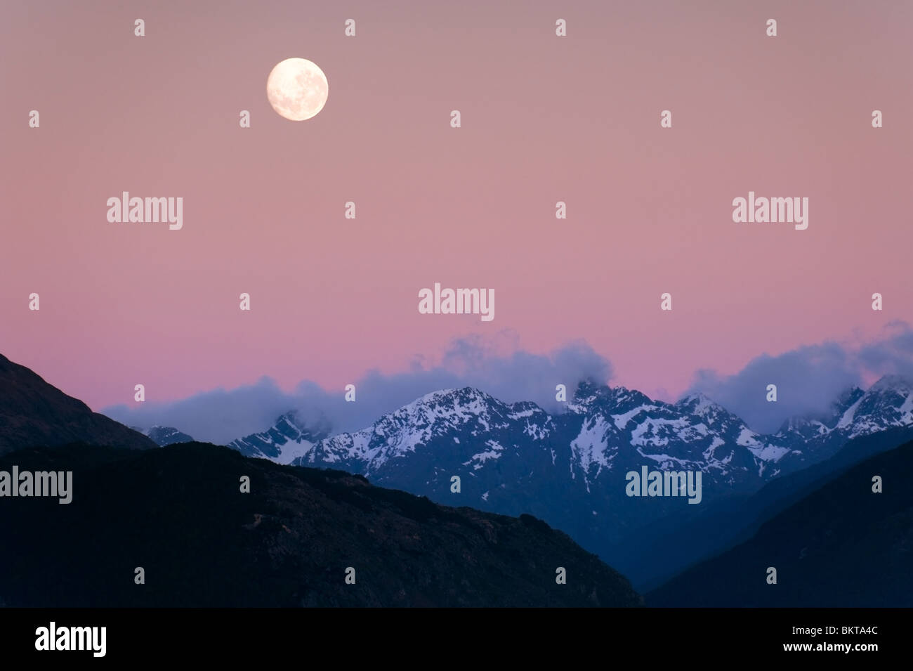 New Zealand South Island. Moon over mountains Stock Photo - Alamy