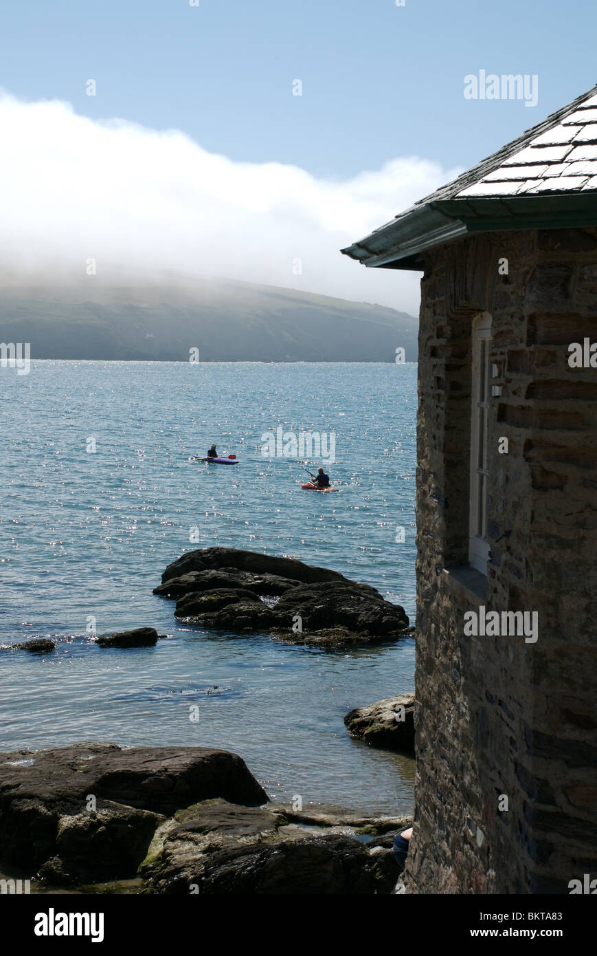 Cottage and sea fog, Mothecombe, South Hams, Devon, UK Stock Photo - Alamy