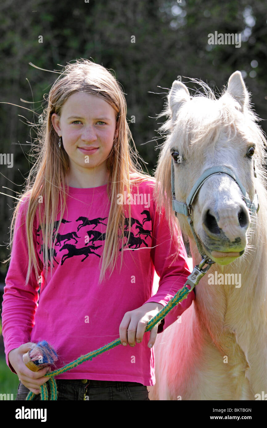 young girl with a pony Stock Photo - Alamy
