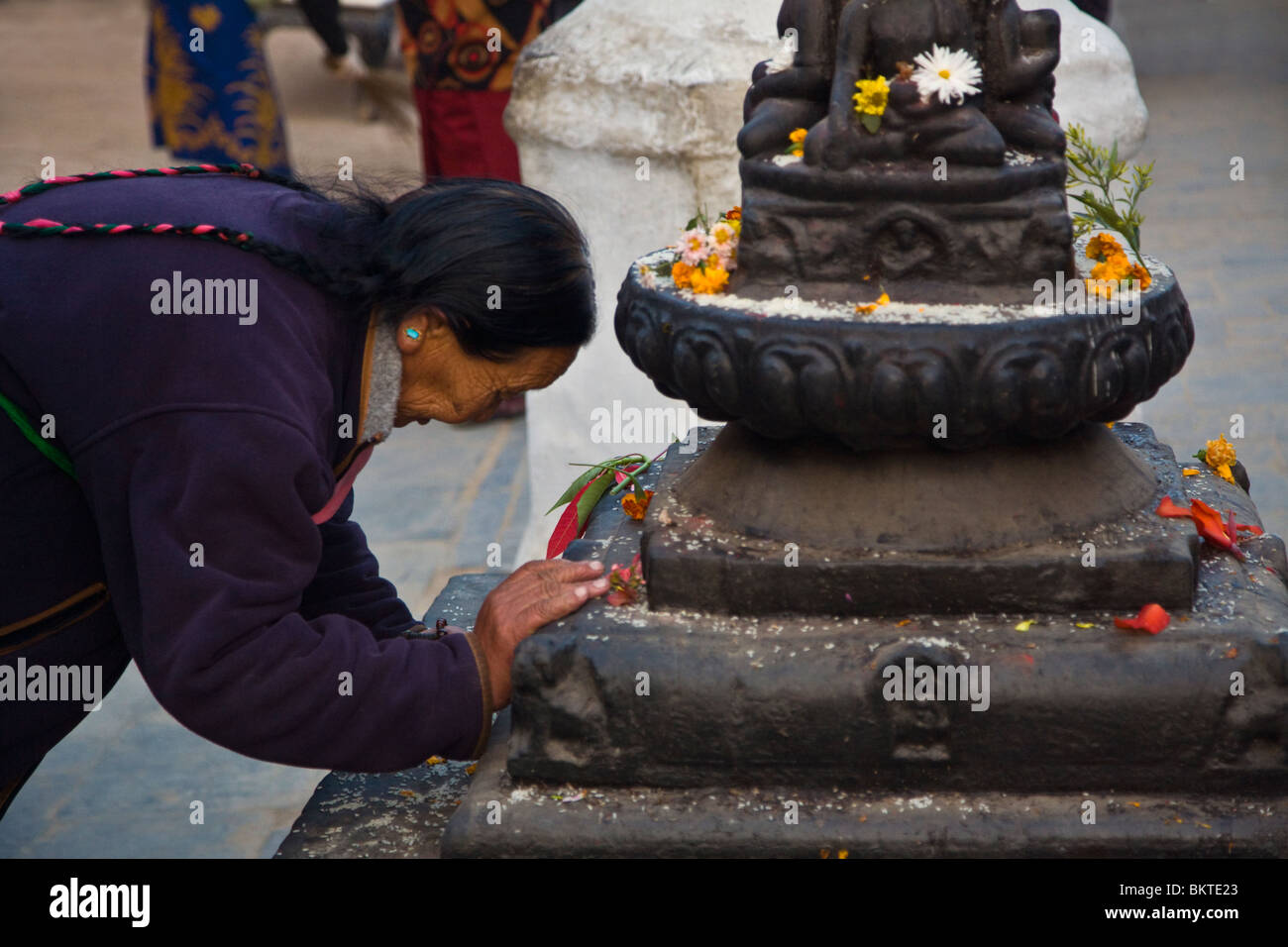 A TIBETAN REFUGEE does her Buddhist practice at BODHA STUPA ...