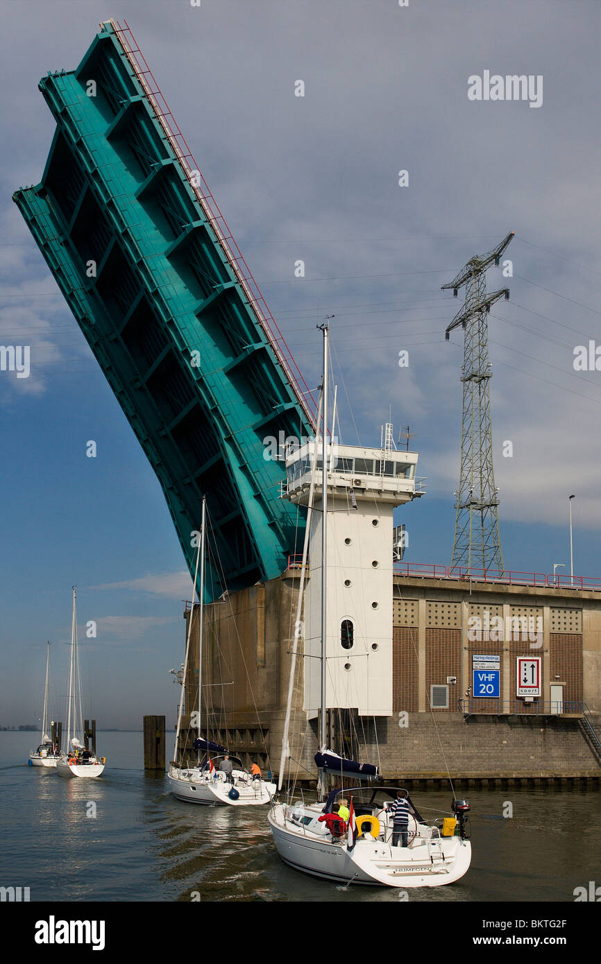 Haringvliet bridge, open, sailing boats passing by Stock Photo - Alamy